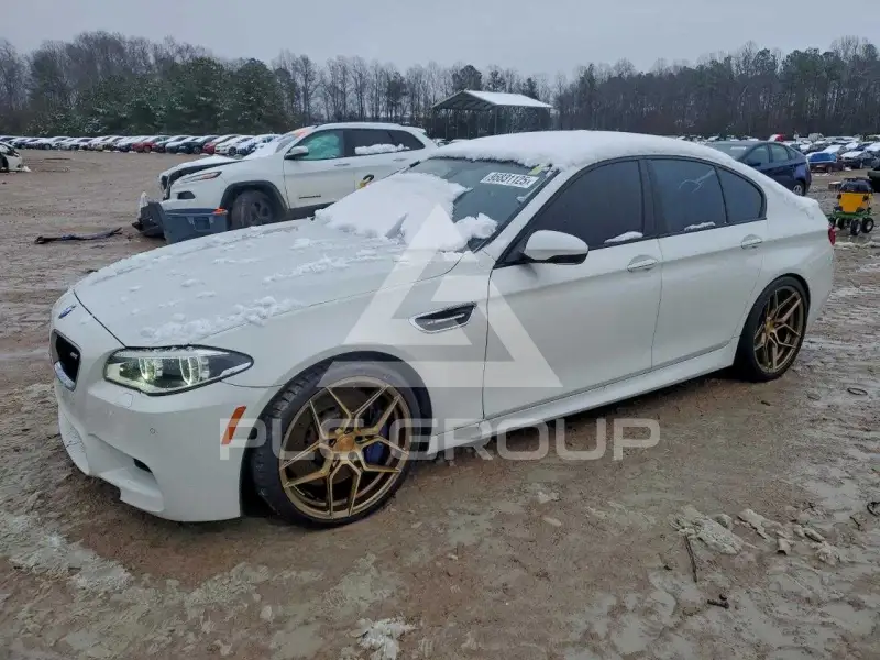2014 BMW M5 VIN: WBSFV9C52ED097279 from the USA - PLC Group